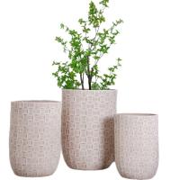 China Round Fiber Clay Planter 5-6 Years Outdoor Durable Lightweight Textured Neutral Beige Flower Pot for sale