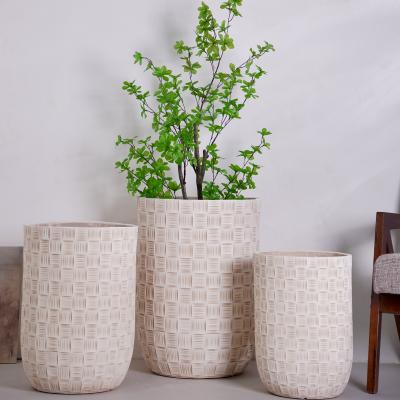 China Round Fiber Clay Planter 5-6 Years Outdoor Durable Lightweight Textured Neutral Beige Flower Pot for sale