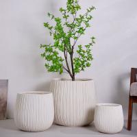 China Vertical Ribbed Pattern Neutral Beige Round Fiber Clay Lightweight Durable Planter for sale