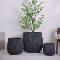 China Vertical Ribbed Pattern Neutral Beige Round Fiber Clay Lightweight Durable Planter for sale