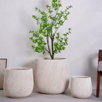 China Diagonal Lines Pattern Neutral Beige Round Fiber Clay Planter Weatherproof for sale