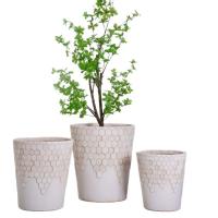 China Smooth Honeycomb Pattern Neutral Beige Round Fiber Clay Planter for sale
