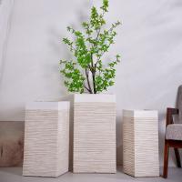 China Neutral Beige Vertical Stripe Pattern Round Fiber Clay Flower Pot In Upscale Settings for sale