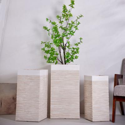 China Neutral Beige Vertical Stripe Pattern Round Fiber Clay Flower Pot In Upscale Settings for sale