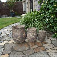 China Round Fiber Clay Planter 5-6 Years Outdoor Durable Lightweight Custom Color for sale