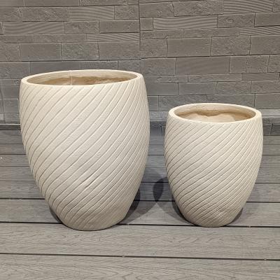 China Cylindrical Shape Neutral Beige Fiber Clay Planter Evenly Spaced Ridges Pattern for sale