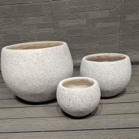 China Neutral Beige Fiber Clay Planter Round Lightweight Stone Mimic Design 3 Sizes Custom Color for sale