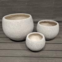 China Neutral Beige Fiber Clay Planter Round Lightweight Stone Mimic Design 3 Sizes Custom Color for sale
