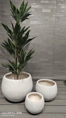China Neutral Beige Fiber Clay Planter Round Lightweight Stone Mimic Design 3 Sizes Custom Color for sale