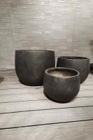 China Timeless Modern Style Black Round Fiber Clay Planter Smooth Matte Pattern for sale