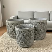 China Repetitive Palm Leaf Pattern Grey Round Fiber Cement Planter Durable Low-maintainence Pot for sale