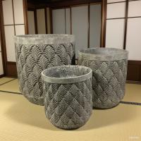 China Repetitive Palm Leaf Pattern Grey Round Fiber Cement Planter Durable Low-maintainence Pot for sale