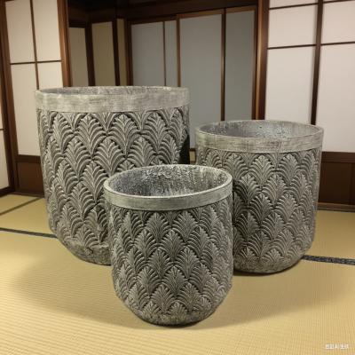 China Repetitive Palm Leaf Pattern Grey Round Fiber Cement Planter Durable Low-maintainence Pot for sale