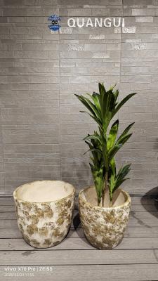 China Fiber Clay Planter Round Natural Stone Texture 2 Sizes Custom Color Hand Carved for sale