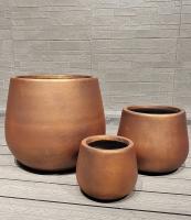 China Fiber Clay Planter Round Egg Shape 5-6 Years Outdoor Durable Lightweight Architectural Landscaping for sale