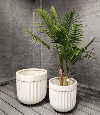 China White Delux Vertical Fluted Fiber Clay Planter Round Egg Shape for Garden Park Landscaping for sale