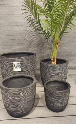 China Quangui Fiber Clay Planter Round Custom Color 5-6 Years Outdoor Use for sale