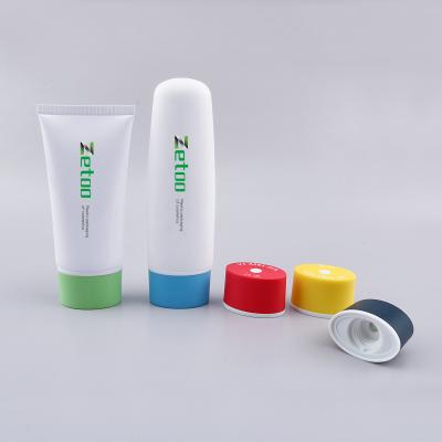 China 40mm Oval Sunscreen Tube Packaging with Two-Color Matt Center-Dispensing Cap - 100ml to 150ml Capacity for sale