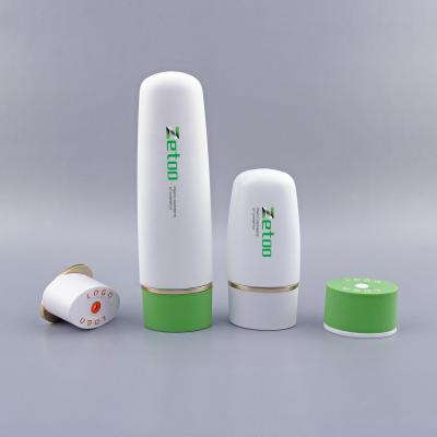 China Custom PE Oval Soft Touch Sunscreen Bottle with 40mm Two-Color Matt Center-Dispensing Cap and 4.2mm Outlet for sale