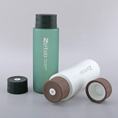 China Custom PE Cosmetic Bottle 45mm Two Color Plaid Center Dispensing Cap Soft Touch for sale