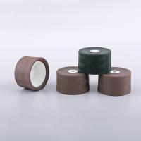 China Custom PE Cosmetic Bottle 45mm Two Color Plaid Center Dispensing Cap Soft Touch for sale