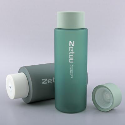 China PE Soft Touch Cosmetic Bottle 45mm Two Color Matt Center Dispensing Cap Custom Capacity for sale