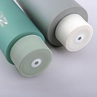 China PE Soft Touch Cosmetic Bottle 45mm Two Color Matt Center Dispensing Cap Custom Capacity for sale