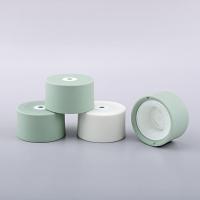China PE Soft Touch Cosmetic Bottle 45mm Two Color Matt Center Dispensing Cap Custom Capacity for sale