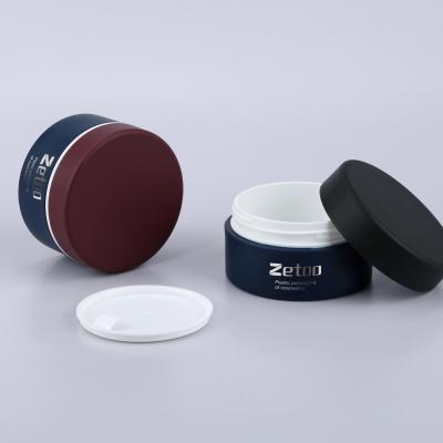 China 50ml Custom Two-Color Soft Touch Plastic Cosmetic Jar with Matte Cap for Creams and Lotions for sale