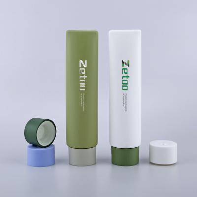 China 120ml Soft Touch PE Cosmetic Bottle with 40mm Two-Color Center Dispensing Cap for Creams and Lotions for sale