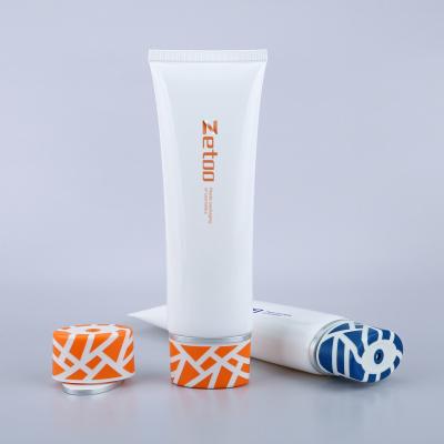 China 40mm Oval Sunscreen Container 70ml-180ml with Two-Color Nest Design Center-Dispensing Cap for Cosmetics for sale