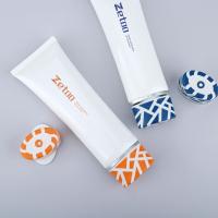 China 40mm Oval Sunscreen Container 70ml-180ml with Two-Color Nest Design Center-Dispensing Cap for Cosmetics for sale