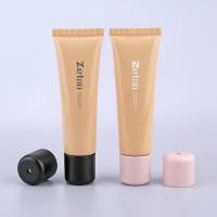 China 25mm Diameter PE Cosmetic Tube 20ml-60ml with Two-Color Matt Center-Dispensing Cap for sale