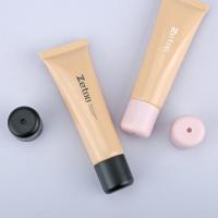 China 25mm Diameter PE Cosmetic Tube 20ml-60ml with Two-Color Matt Center-Dispensing Cap for sale