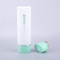 China Custom PE Oval Cosmetic Bottle 120ml with Two-Color Matt Center Dispensing Cap 40mm for sale