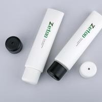China Custom PE Cosmetic Bottles 100ml-250ml with 35mm Two-Color Soft Touch Center Dispensing Cap for sale
