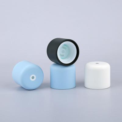China 40mm TPE Soft Touch Center-Dispensing Cap with 4.2mm Outlet for Cosmetic Bottles and Tubes for sale