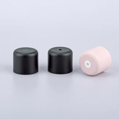 China TPE Soft Touch 30mm Two Color Cosmetic Dispensing Cap with 4.2mm Outlet and 40mm Diameter for sale