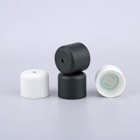 China 35mm TPE Soft Touch Center Dispensing Cap with 4.2mm Outlet for Cosmetic Packaging for sale