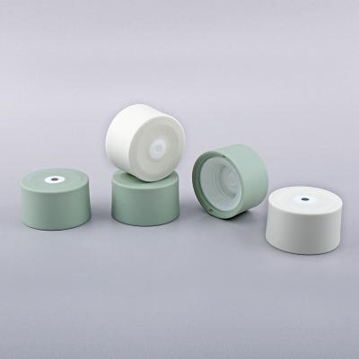 China 45mm TPE Soft Touch Center Dispensing Cap with 4.2mm Outlet for Cosmetic Packaging - Custom Colors Available for sale
