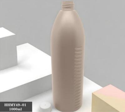 China Customized Plastic Luxury Shampoo Bottles 1000ml PE Bottle with Screw Cap for sale