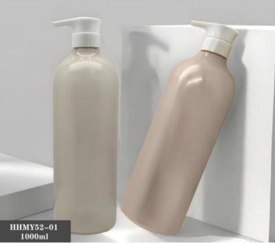 China Customized Plastic Luxury Shampoo Bottles 1000ml PET Bottle for sale