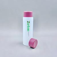 China PE Soft Touch Cosmetic Bottle 45mm Diameter Two Color Matt Center Twist Cap Custom Capacity for sale