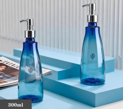 China Customized Plastic Luxury Shampoo Bottles 300ml PET Bottle for sale