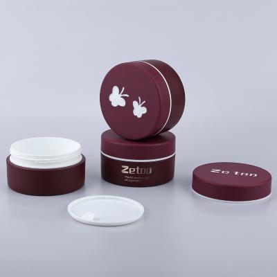 China 100ml PP Red Color Cosmetic Jar Beauty Cream Container With Butterfly Pattern Cap Custom Logo Empty Packaging for sale
