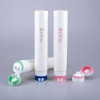 China TPE Soft Touch 35mm Diameter Two Color Children Tooth Paste Flip Cap for sale