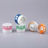 China TPE Soft Touch 35mm Diameter Two Color Children Tooth Paste Flip Cap for sale