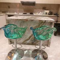 China Gas Lift Luxury Counter Stools Metal Base Sculptural Resin Bar Stool for sale