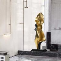 China Metal Fiberglass Abstract Sculptures Gold Black Sculpture Marble Base Decorative Art for sale