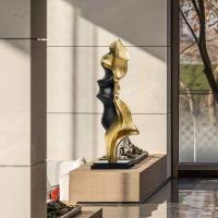 China Metal Fiberglass Abstract Sculptures Gold Black Sculpture Marble Base Decorative Art for sale